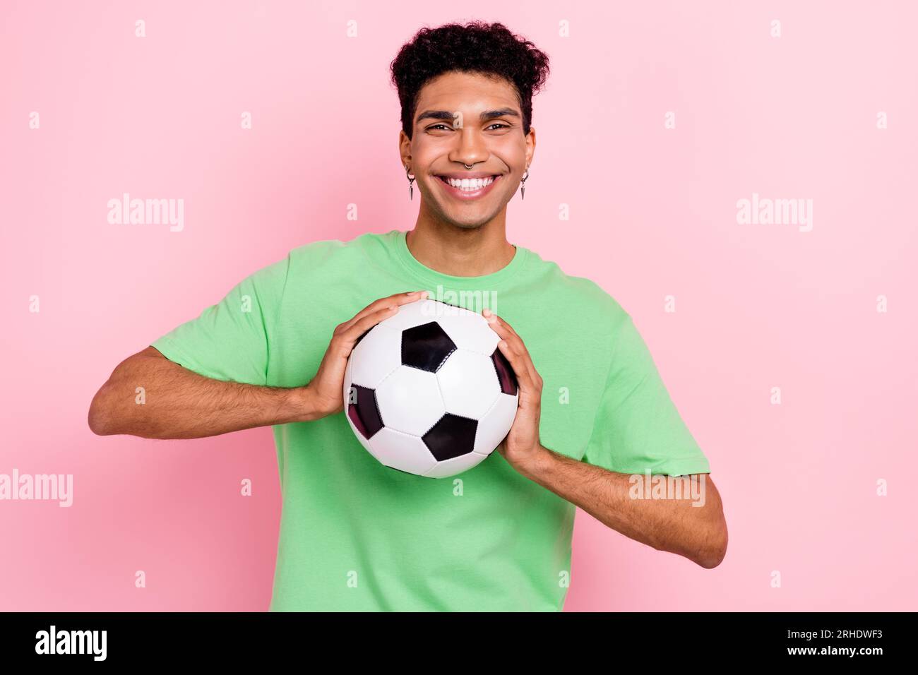Photo of positive nice man champion wear trendy green clothes play ...