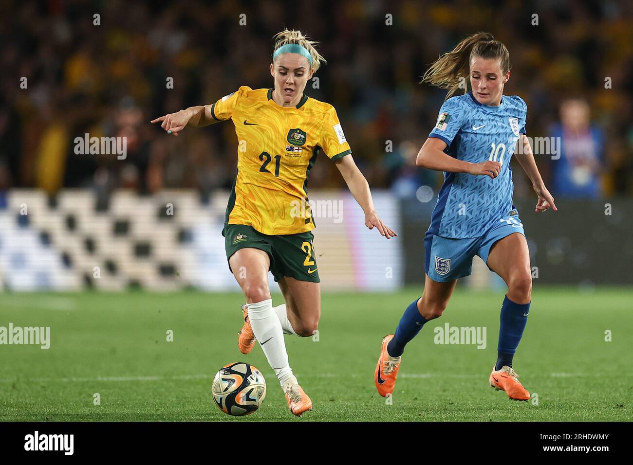 Ellie Carpenter #21 of Australia holds the ball as Ella Toone #10 of ...