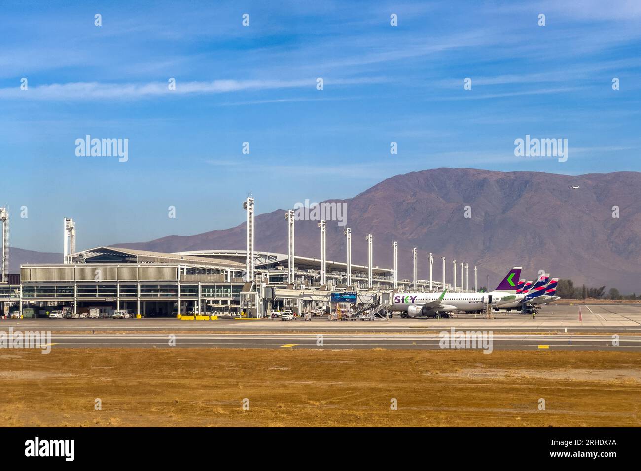 Airliners parked at the gates at the Arturo Merino Benítez ...