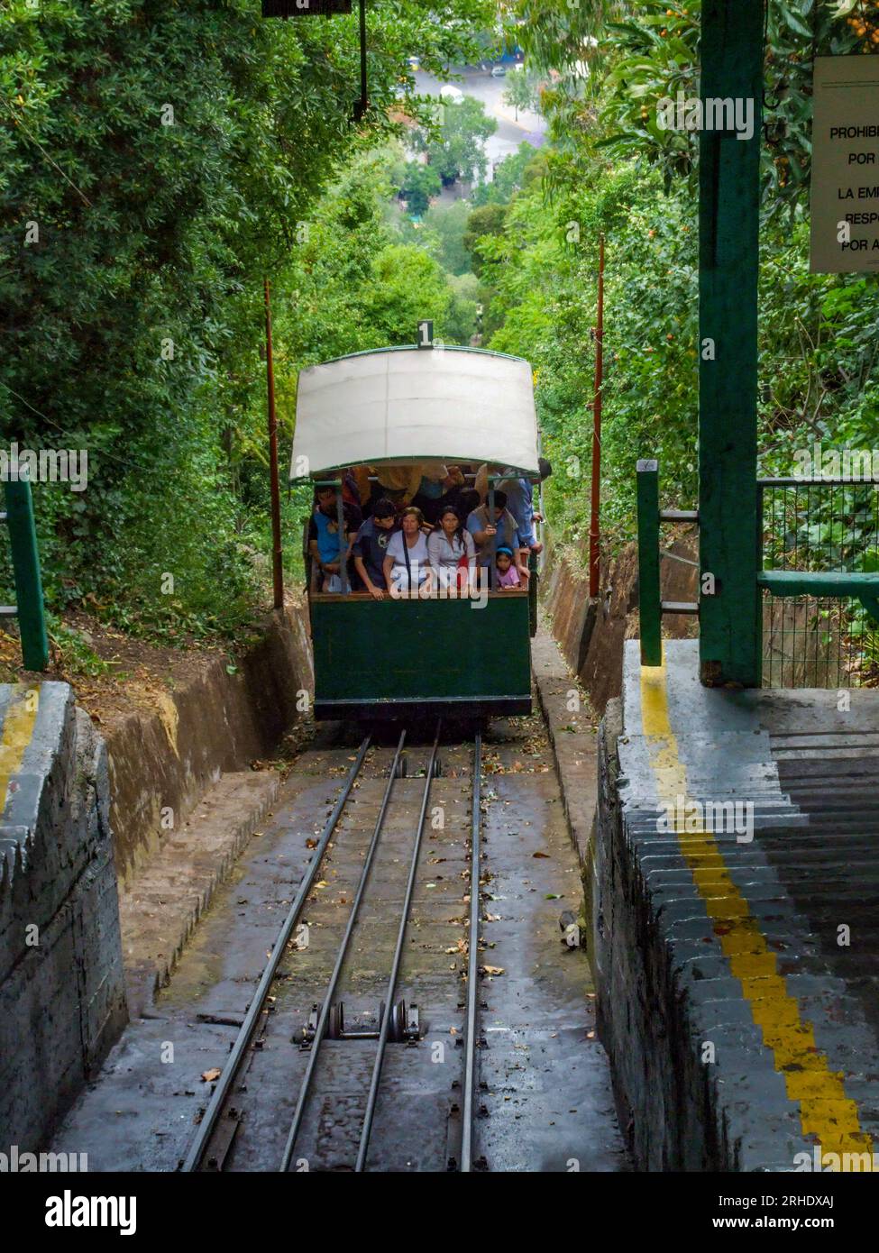 Passengers on the Funicular de Santiago, a funicular railway in the ...