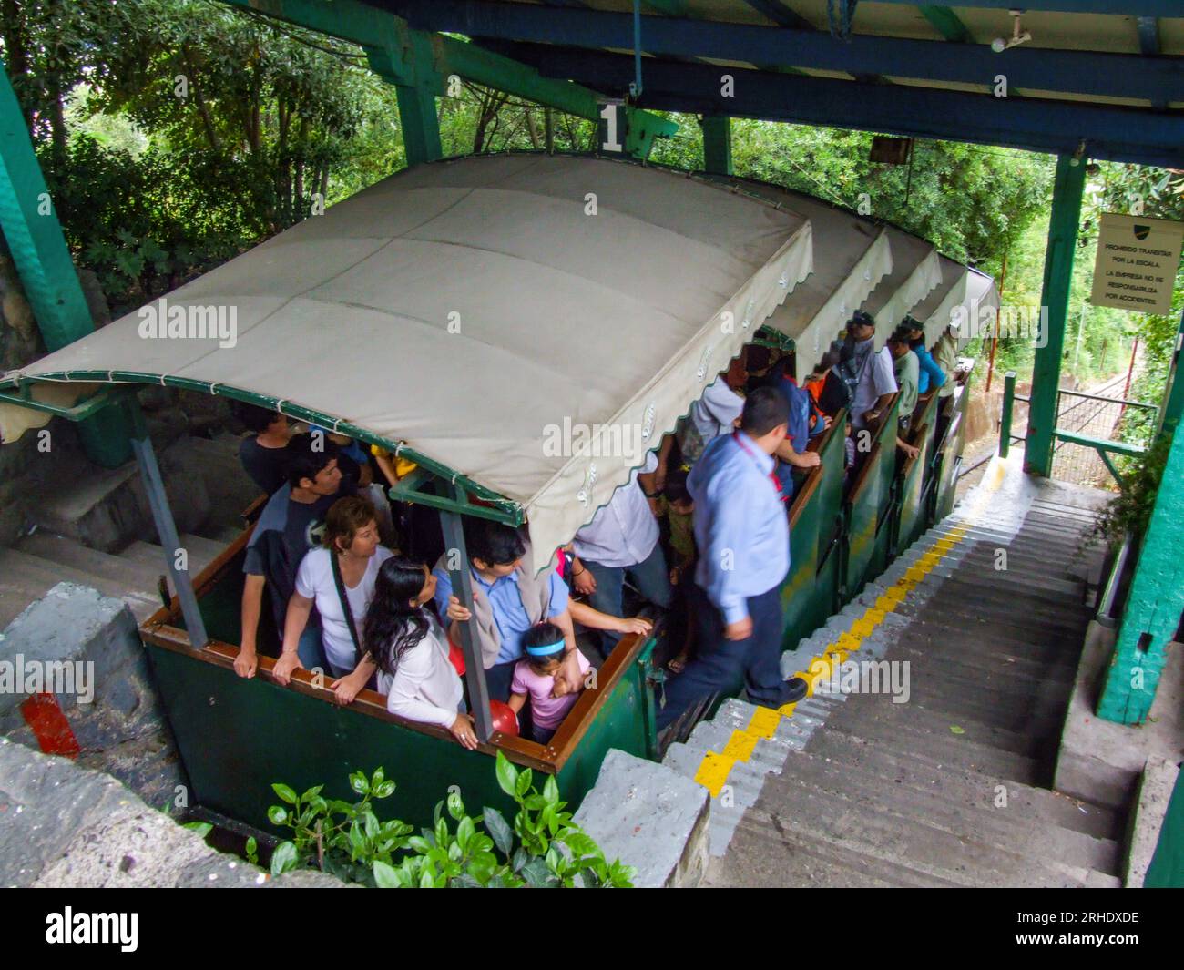 Passengers on the Funicular de Santiago, a funicular railway in the ...