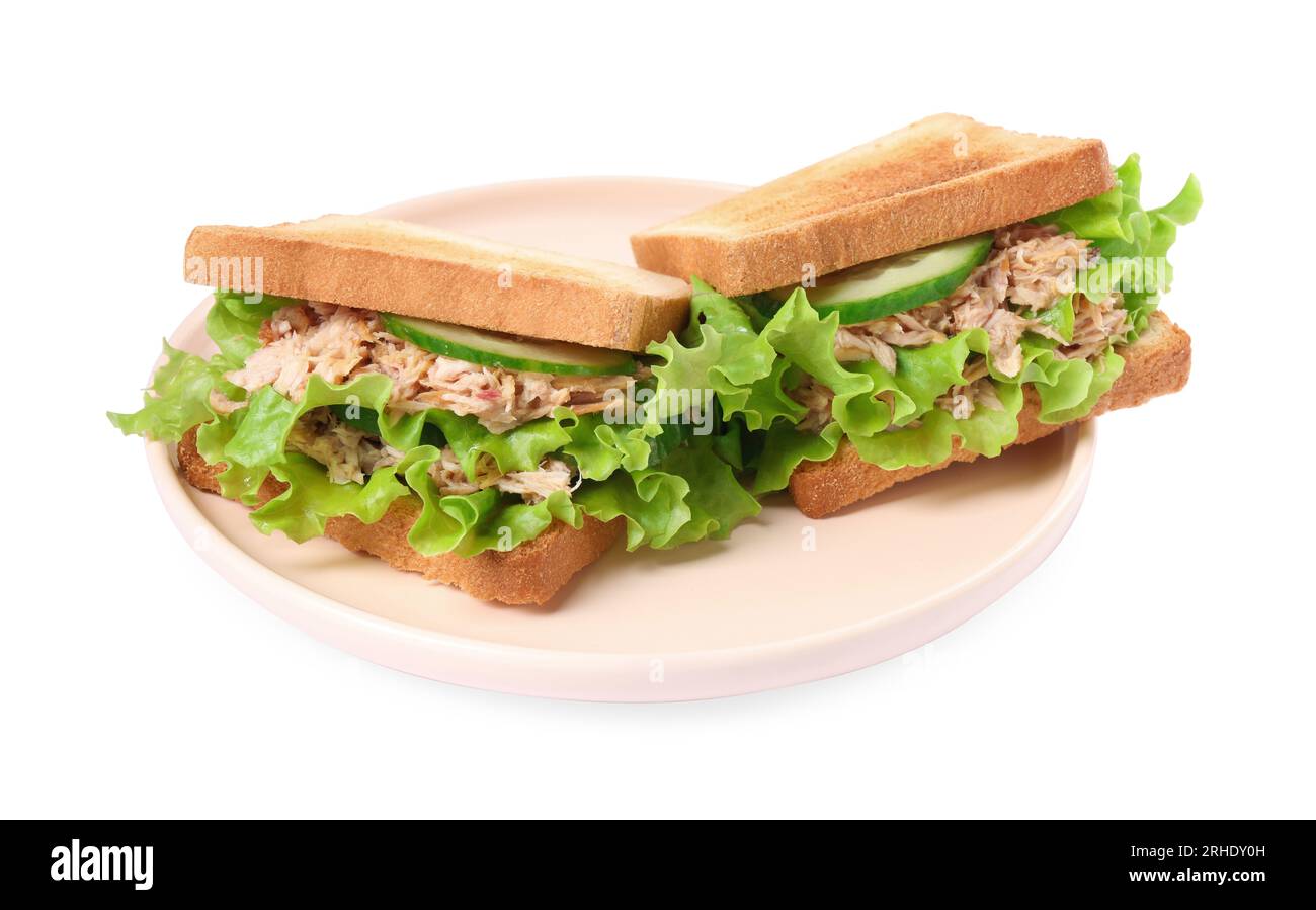 Delicious sandwiches with tuna, lettuce leaves and cucumber on white ...