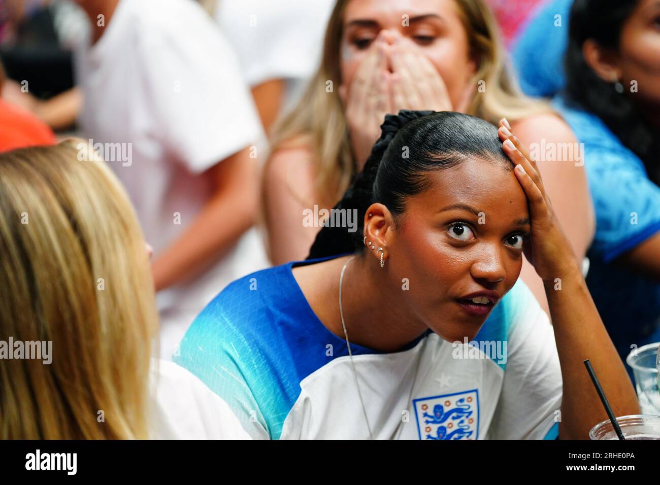 England fans react after Australia's Sam Kerr scored an equalising goal ...