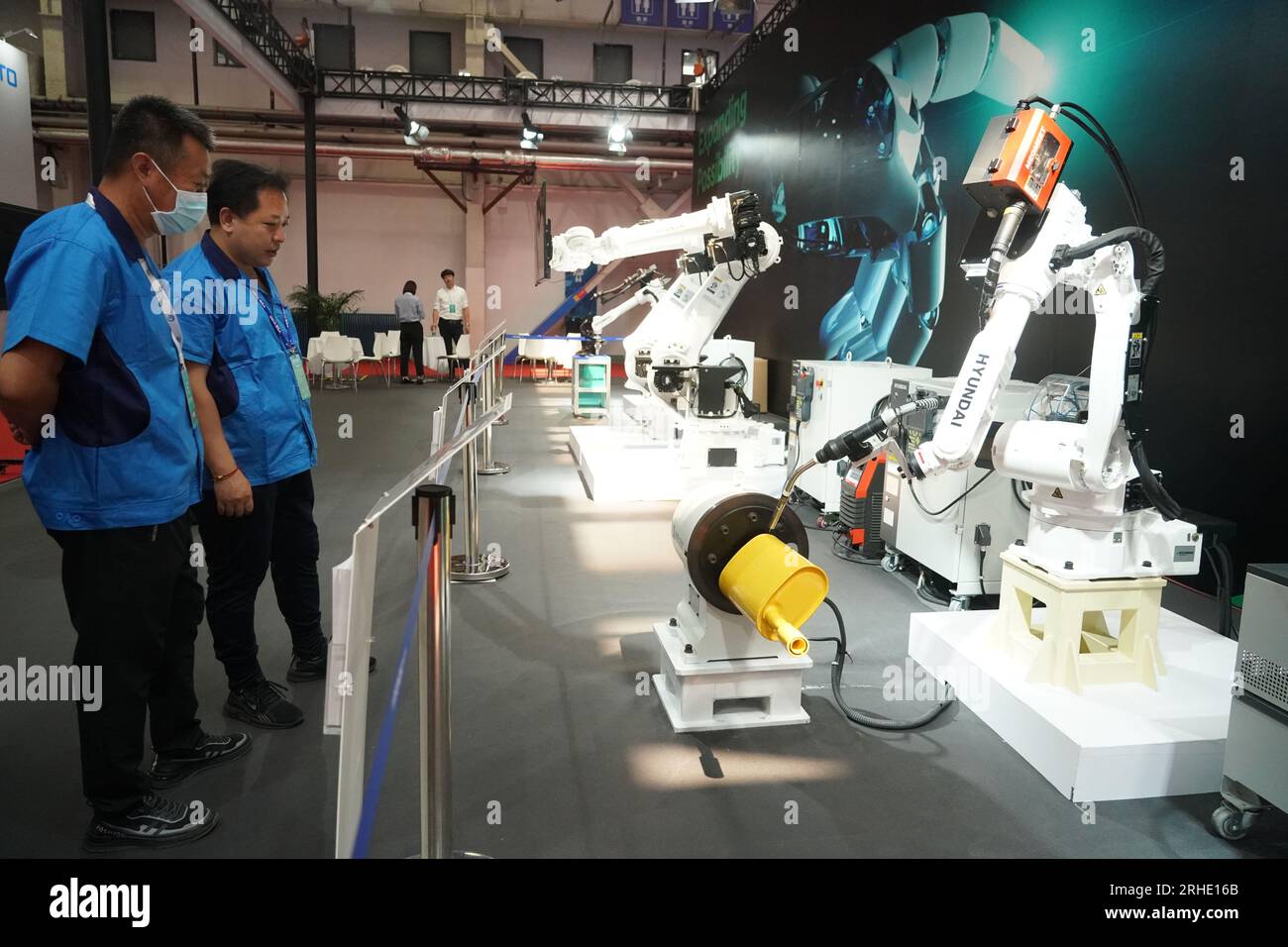 Beijing, China. 16th Aug, 2023. Industrial robots are pictured at the ...