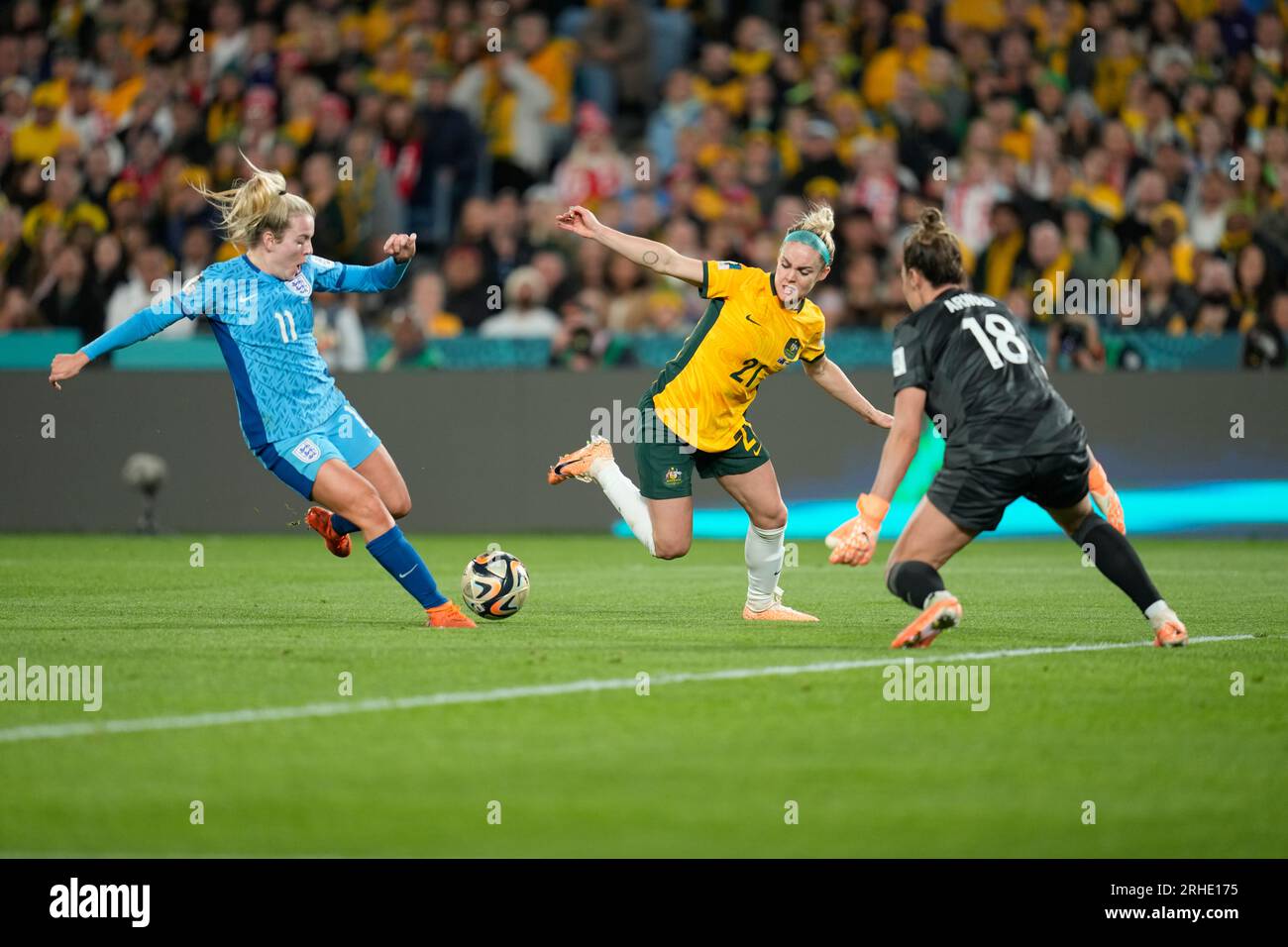 England's Lauren Hemp, left, scores her side's second goal past ...
