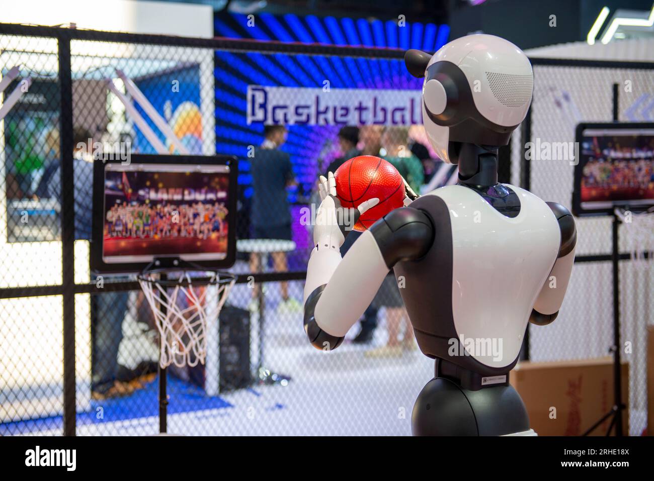 Beijing, China. 16th Aug, 2023. A robot shoots a basketball at the ...