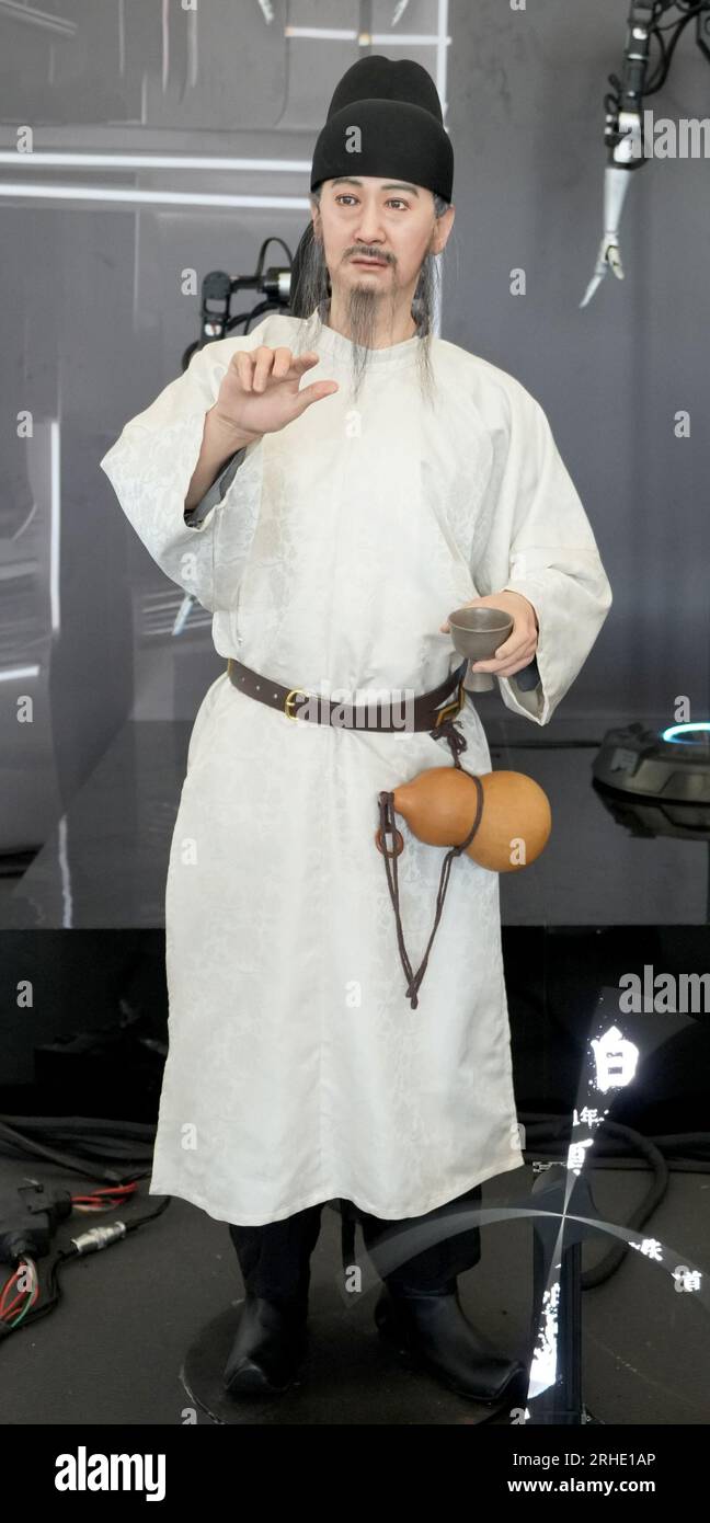 Beijing, China. 16th Aug, 2023. A humanoid robot resembling ancient Chinese poet Li Bai performs ...