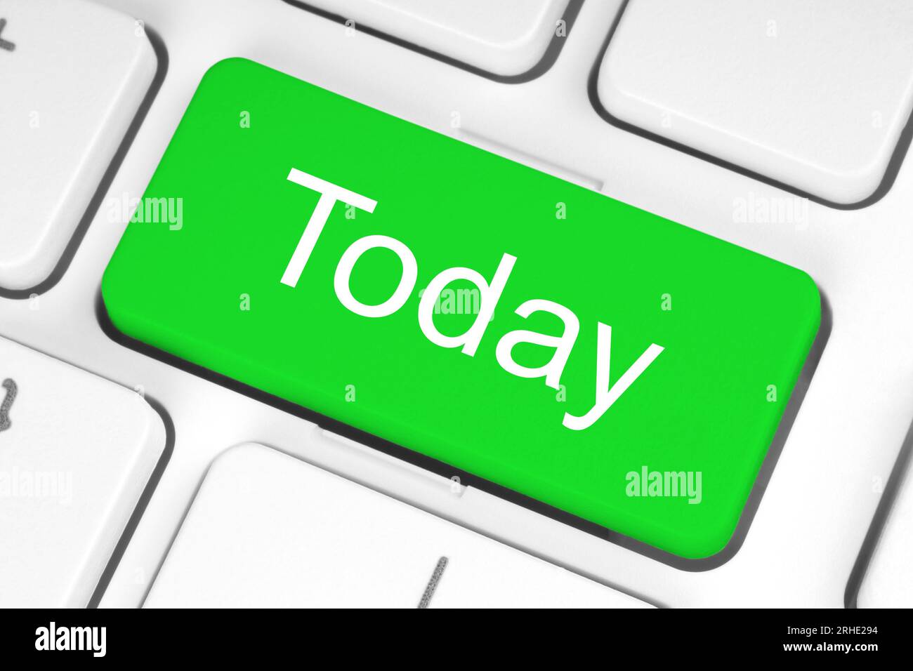 Green button with today words on the keyboard close-up, abstract ...