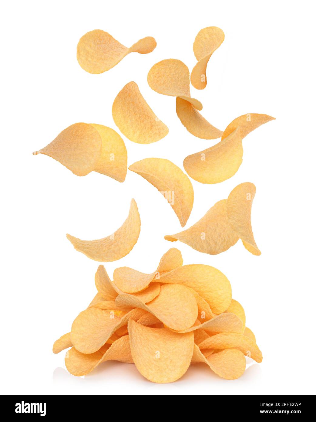 Potato chips falling to potato chips heap, on white background ...