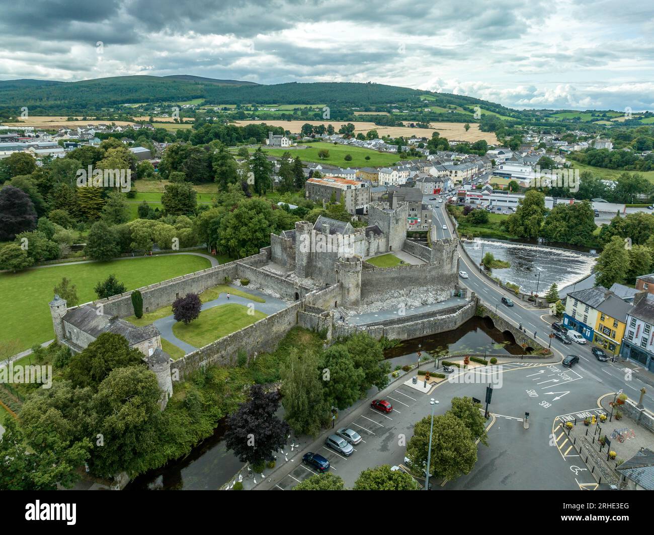Aerial view of Cahir castle and town in Ireland with Tower House, outer ...
