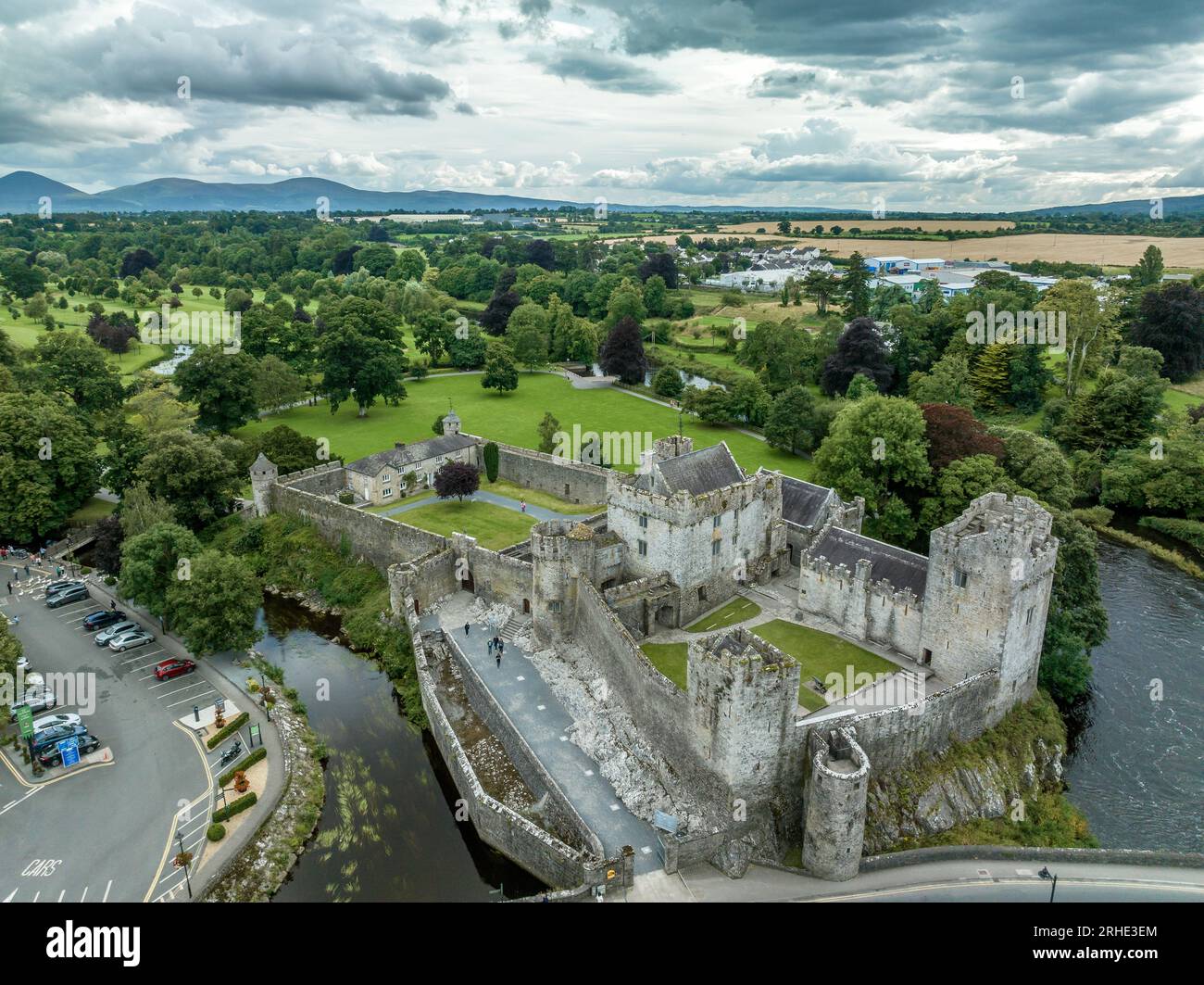 Aerial view of Cahir castle and town in Ireland with Tower House, outer ...