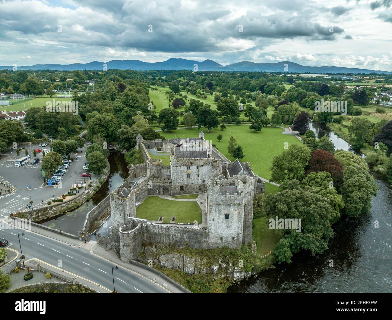 Aerial view of Cahir castle and town in Ireland with Tower House, outer ...