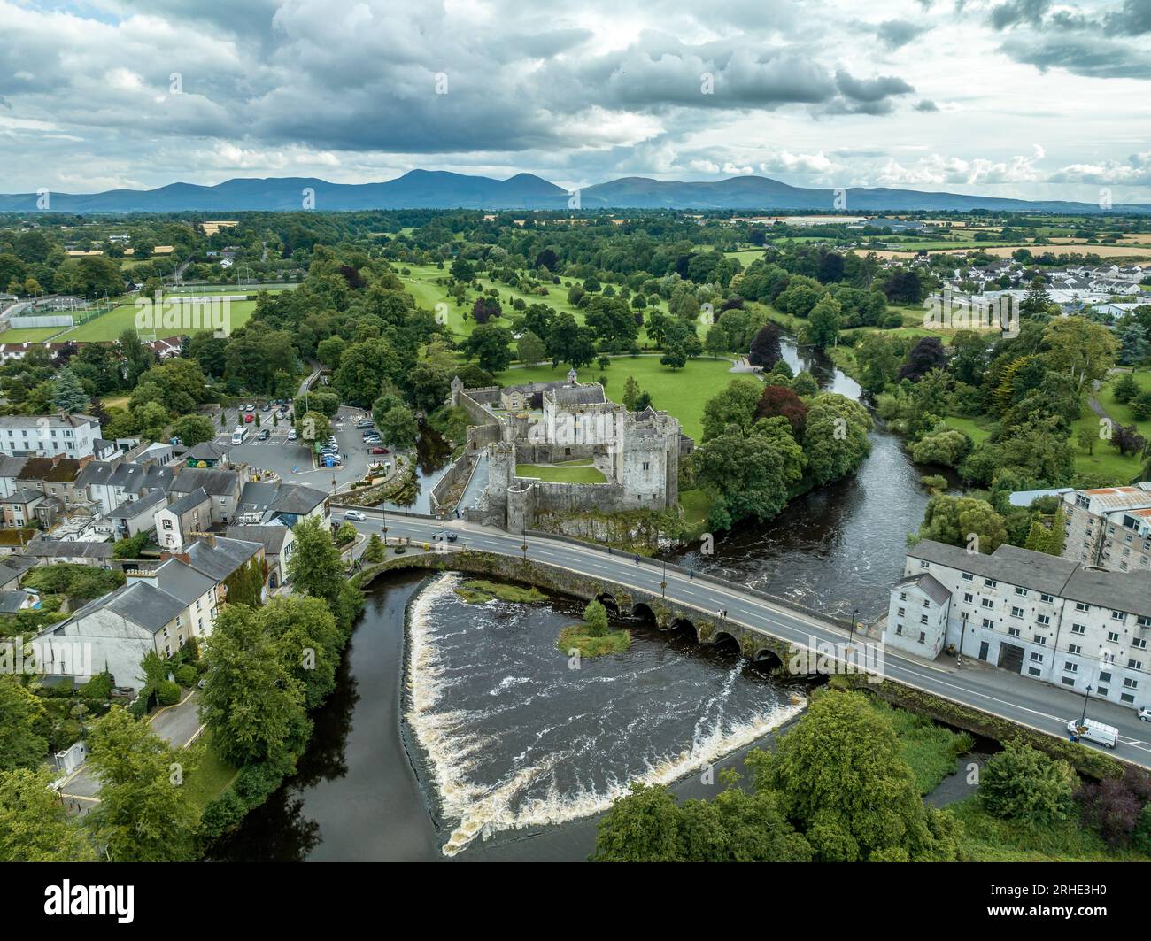 Aerial view of Cahir castle and town in Ireland with Tower House, outer ...