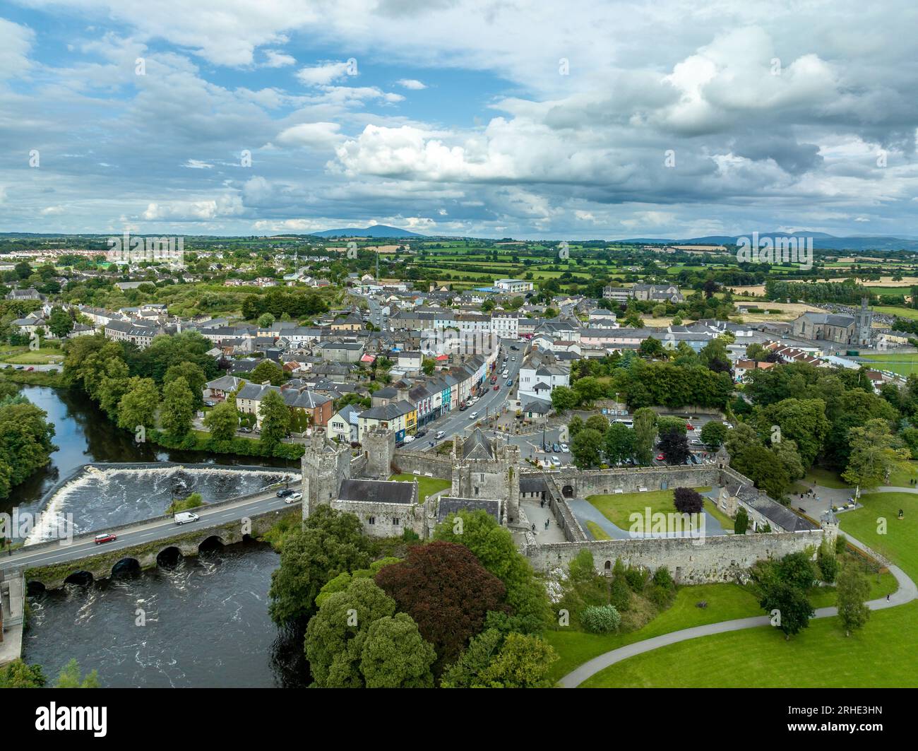 Aerial view of Cahir castle and town in Ireland with Tower House, outer ...