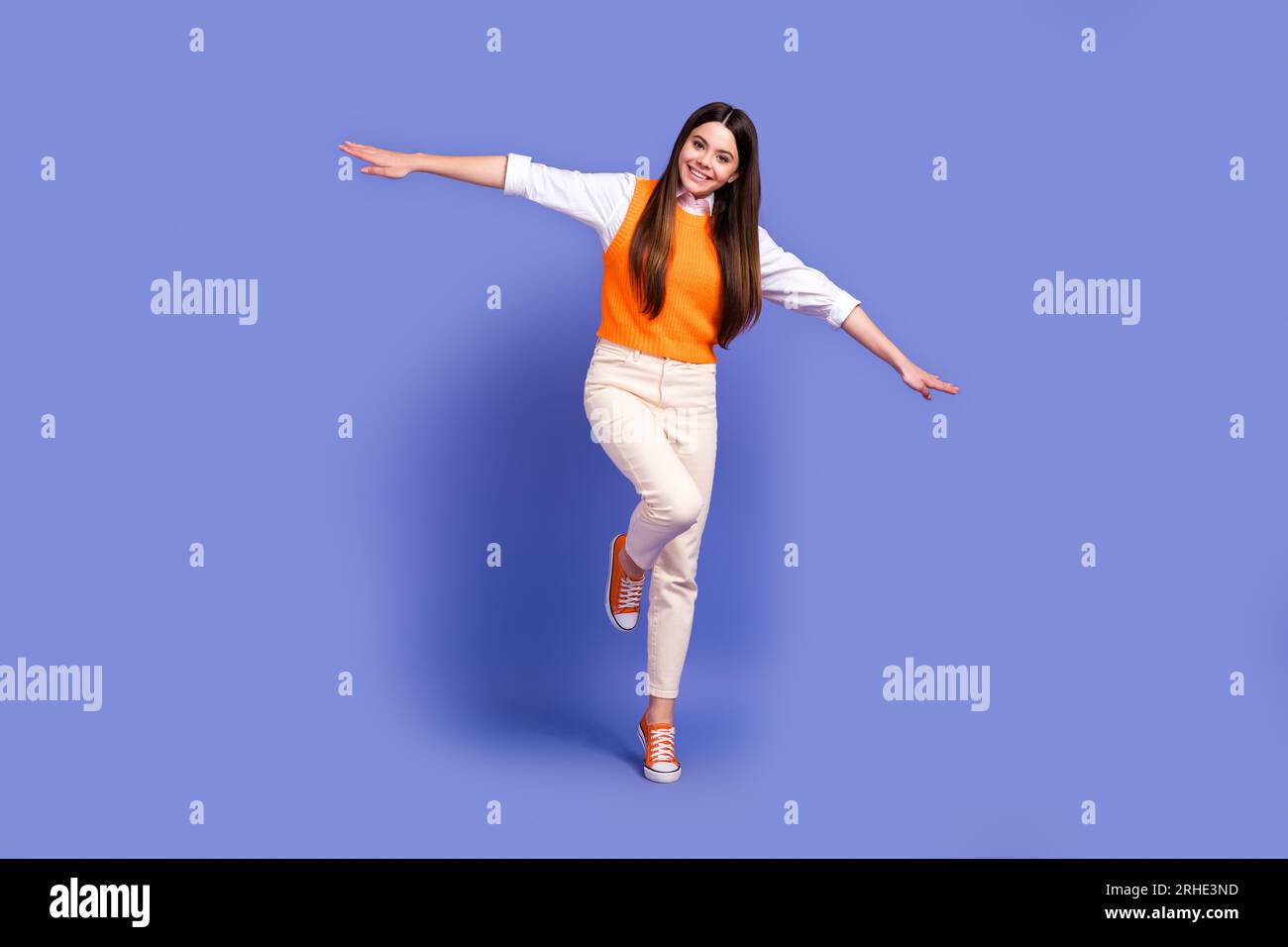 Full body size photo of young school girl preteen flying arms wings try ...