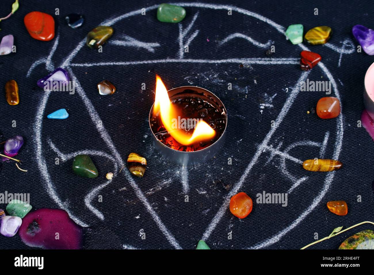 Black magic ritual background with magical altar, candles, crystals and ...