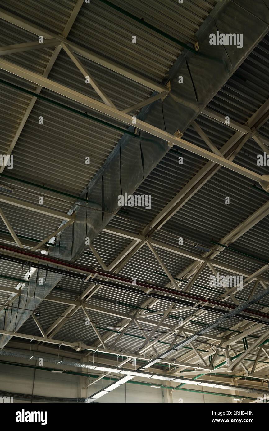 Part of ceiling of spacious warehouse or storage room of modern ...