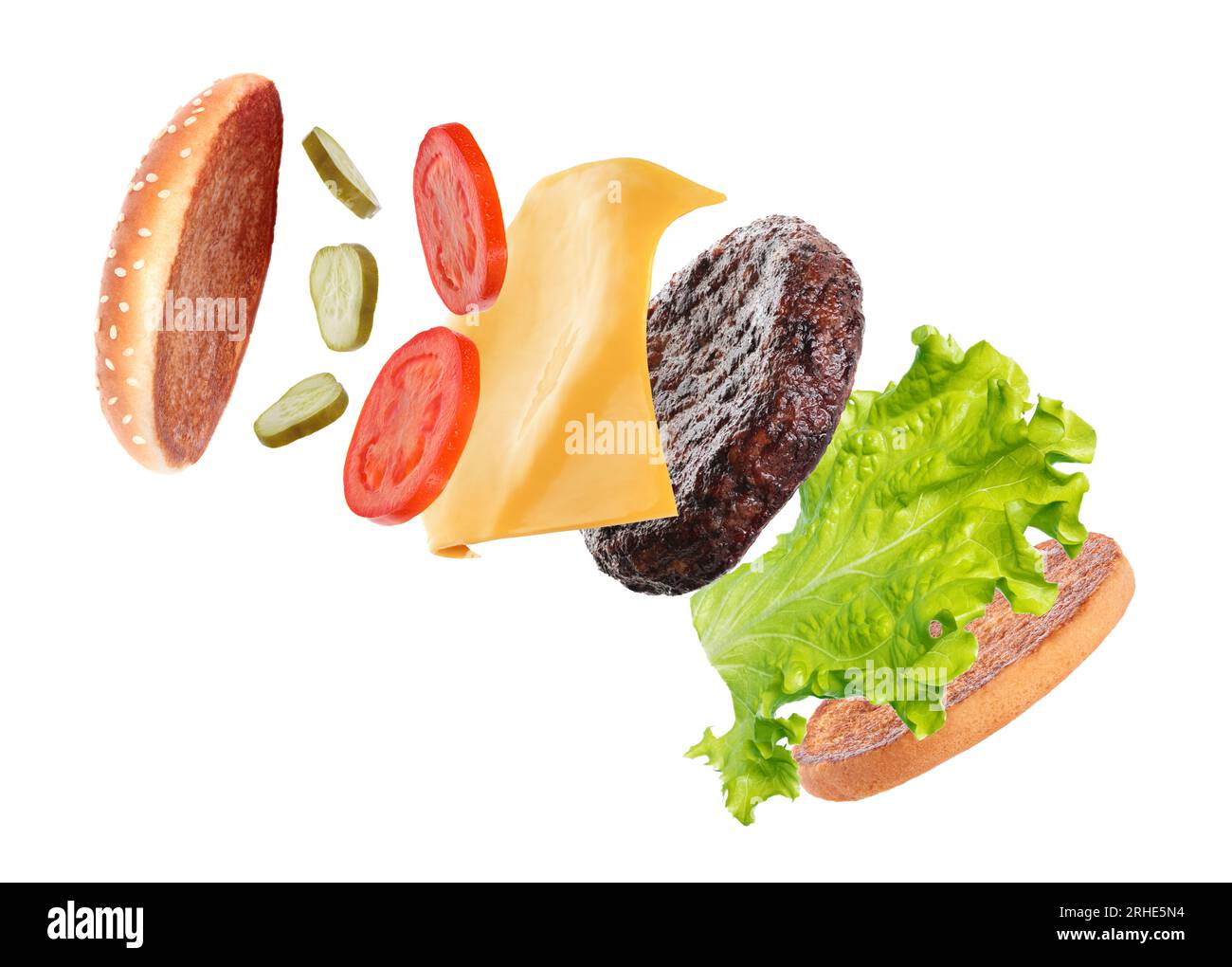 Flying big hamburger isolated on white background Stock Photo - Alamy