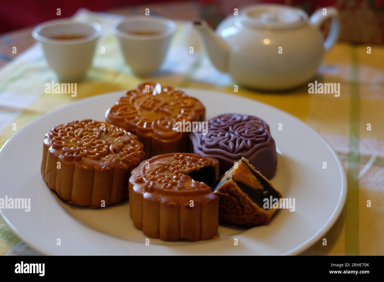 Mid-Autumn Moon Festival, an assortment of four Chinese Mooncakes on a ...