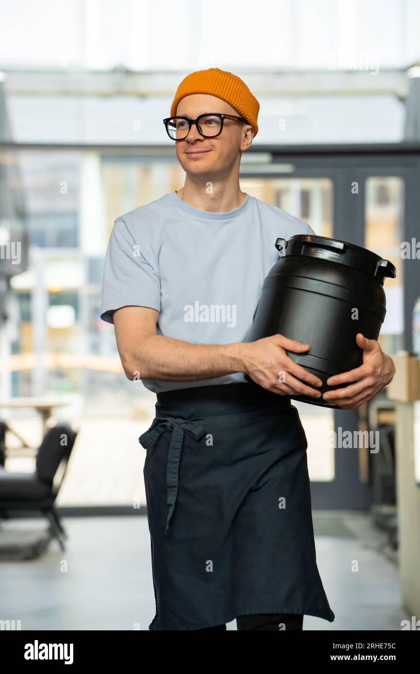 Carrying barrel hi-res stock photography and images - Alamy