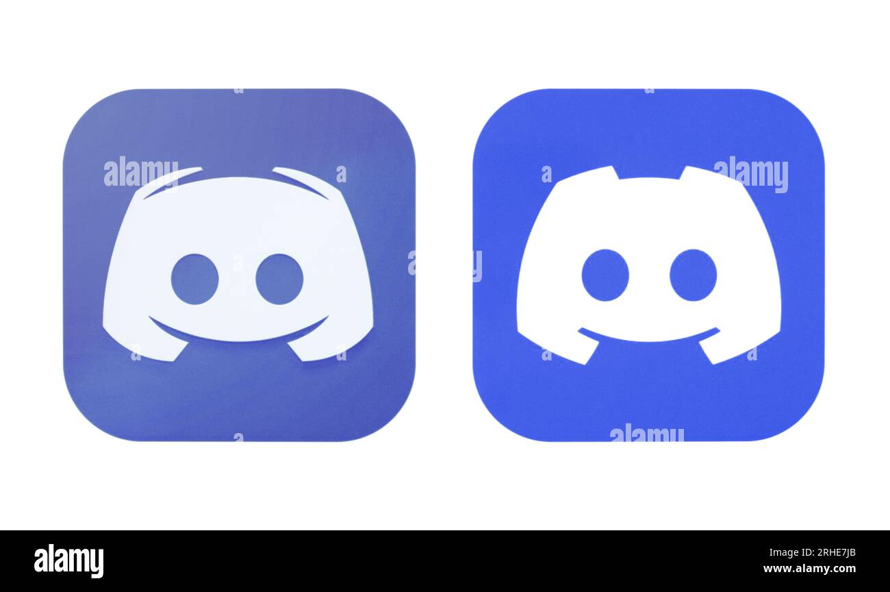 Kiev, Ukraine - August 28, 2022: Old and New icons of Discord app, printed on white paper ...