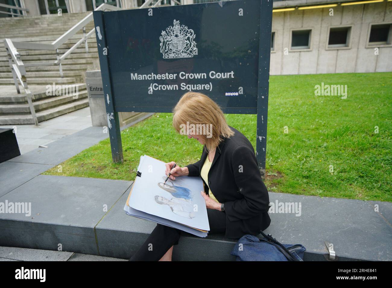 Court artist Elizabeth Cook drawing outside Manchester Crown Court ...