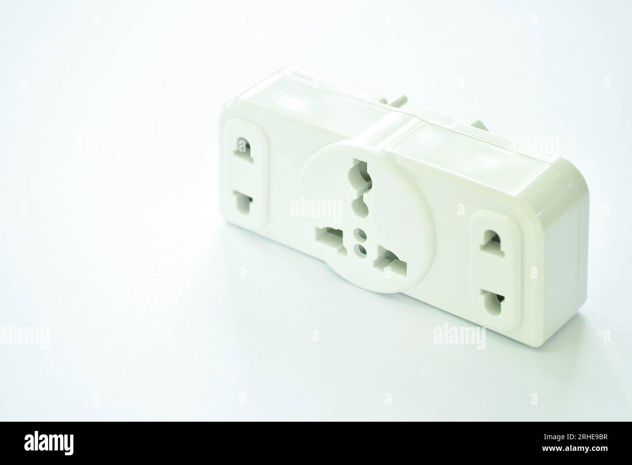 plug socket with variety hole on white background Stock Photo - Alamy