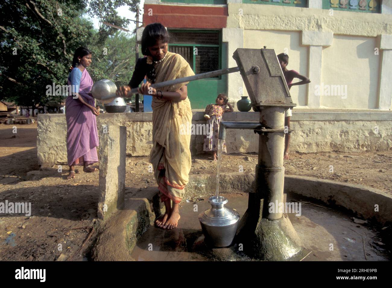 Women at a Water Deep Well or Spring in the city of Bangalore in the ...
