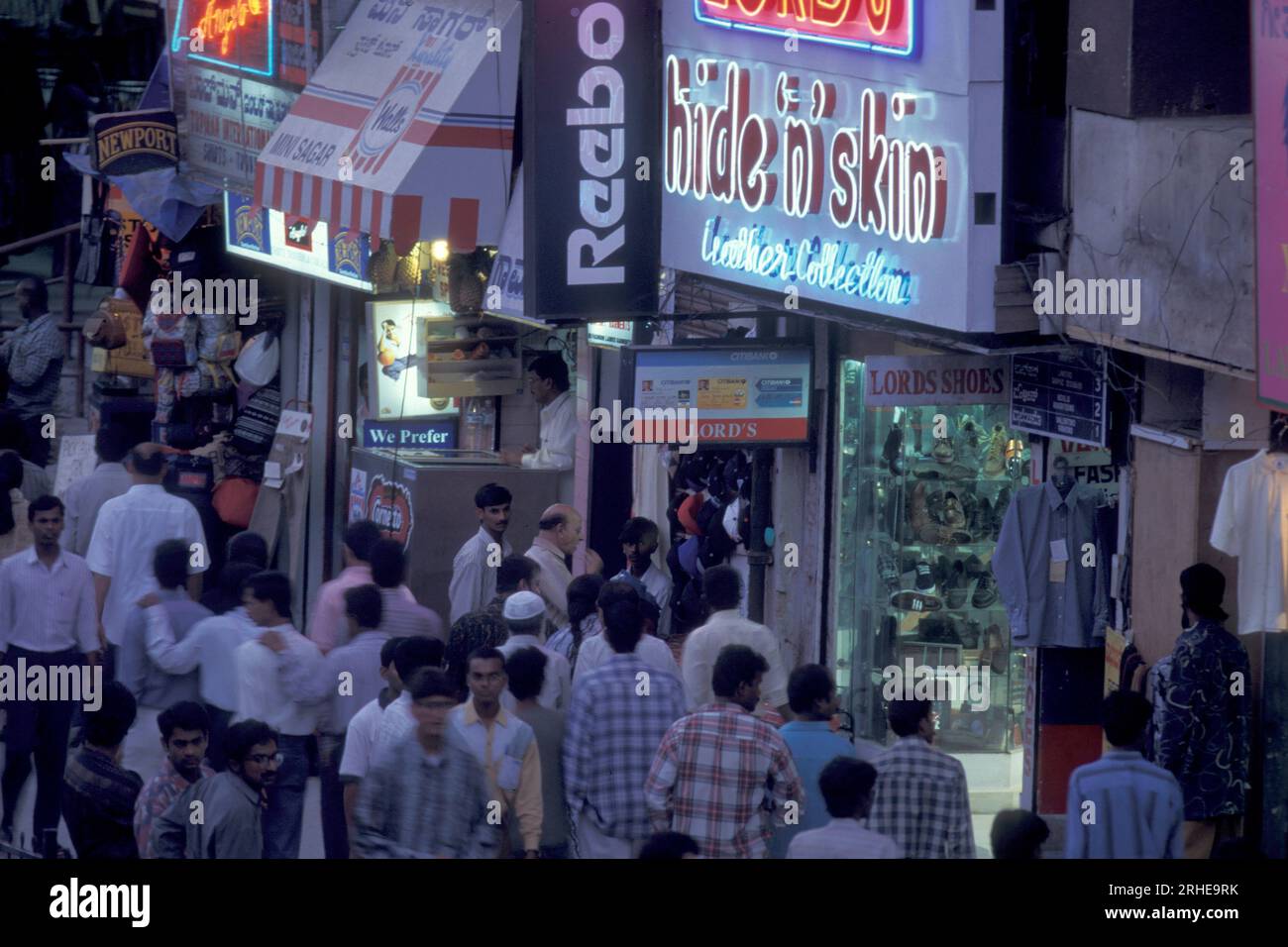 a Road with Shops and Traffic in the city of Bangalore in the Province ...