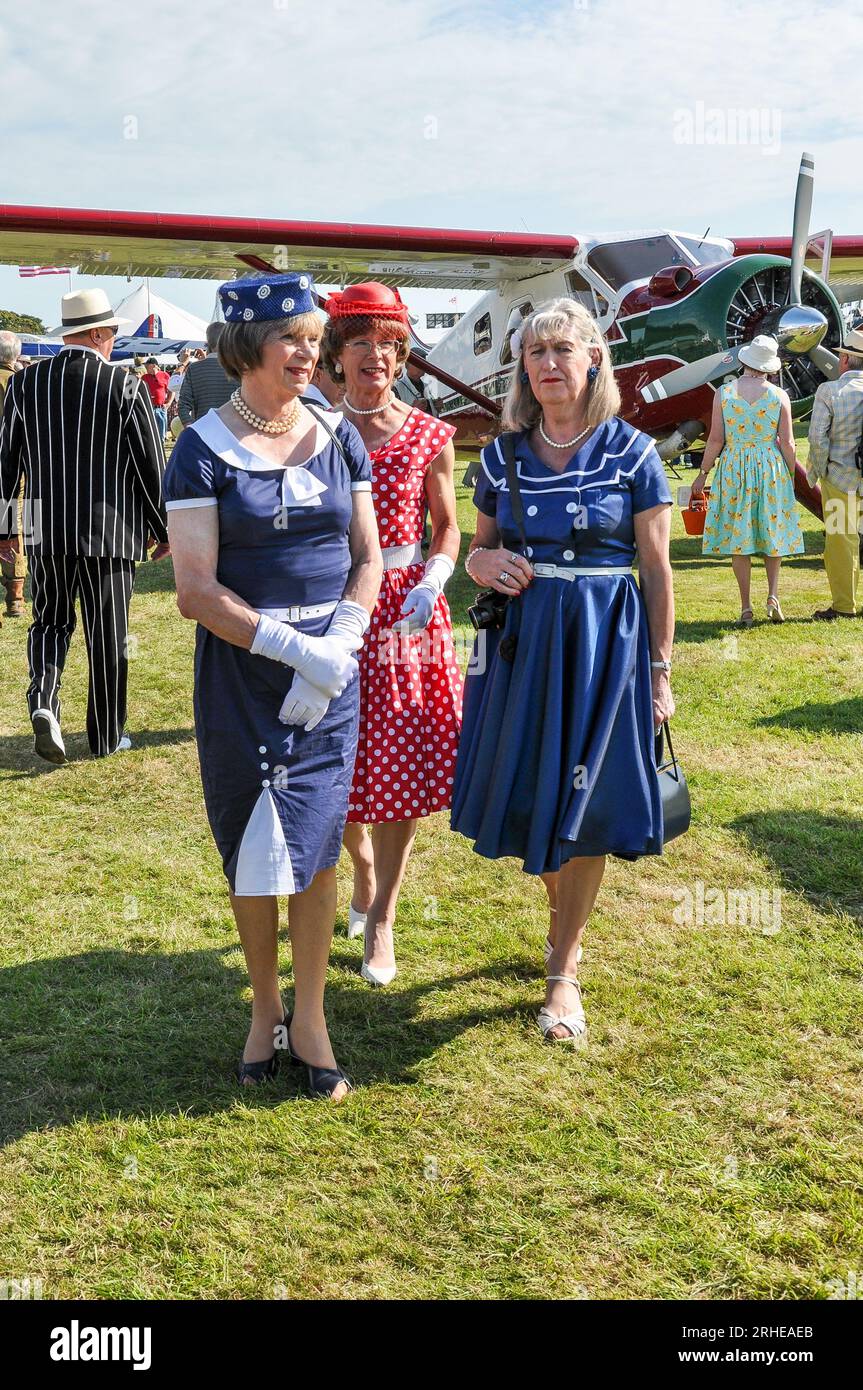 People in vintage, period dress at the Goodwood Revival 2011. Senior ...