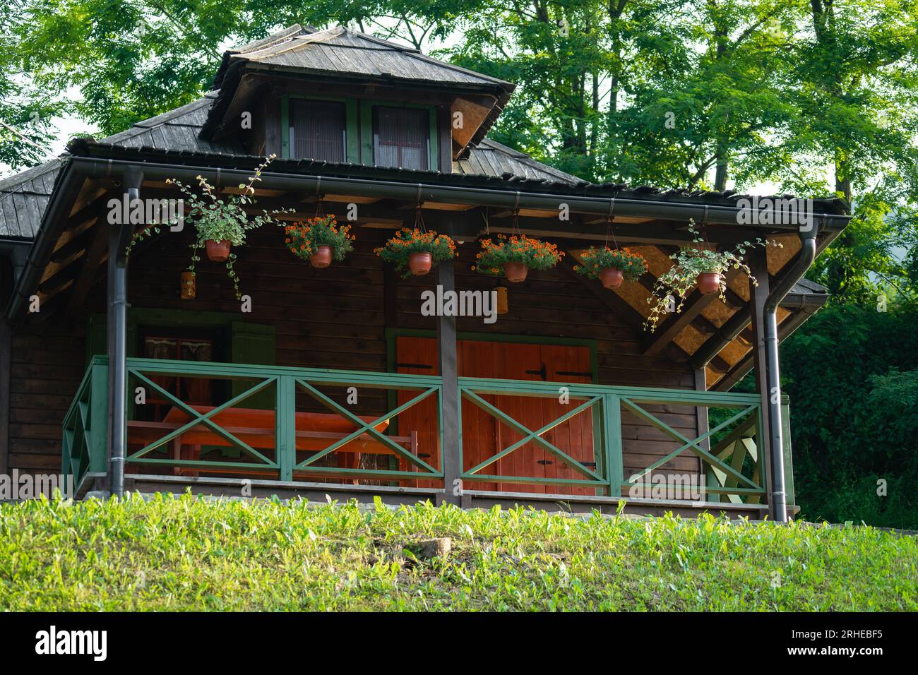 Porch of a wooden house in the forest on the river bank Stock Photo - Alamy