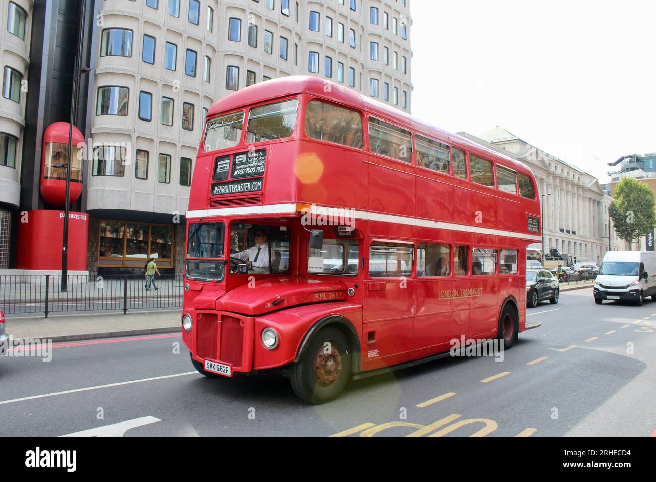 an old style routemaster bus and a new style route master bus on euston ...