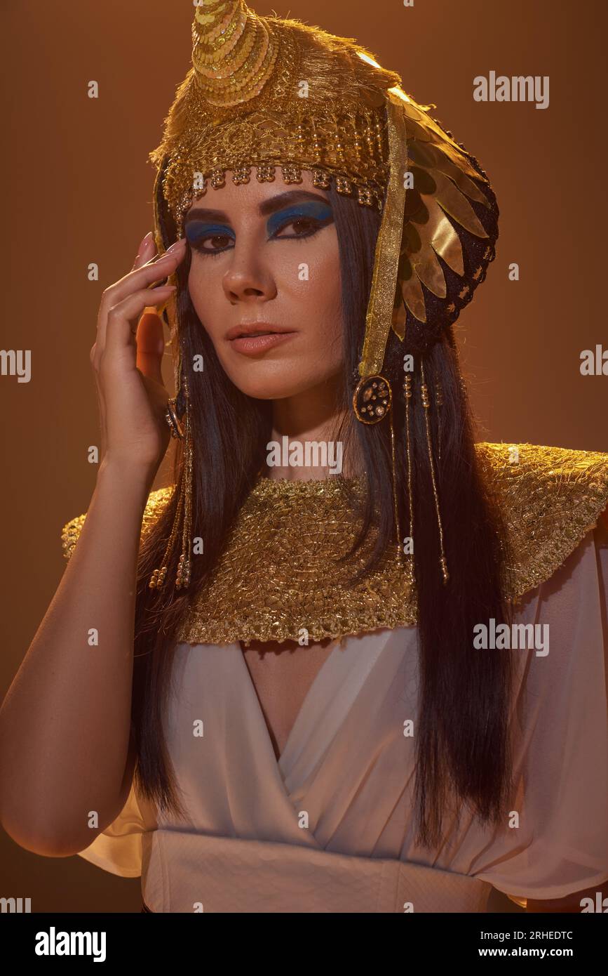 Portrait of brunette woman in traditional egyptian look and bold makeup ...