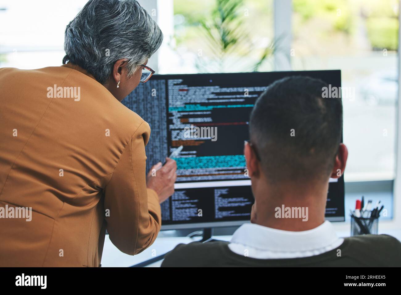 Advice, manager and employee with computer screen, programmer and code ...