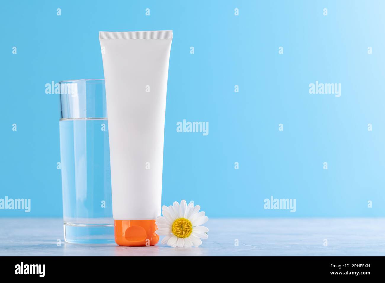 A clean and refreshing image featuring toothpaste tube, promoting oral ...