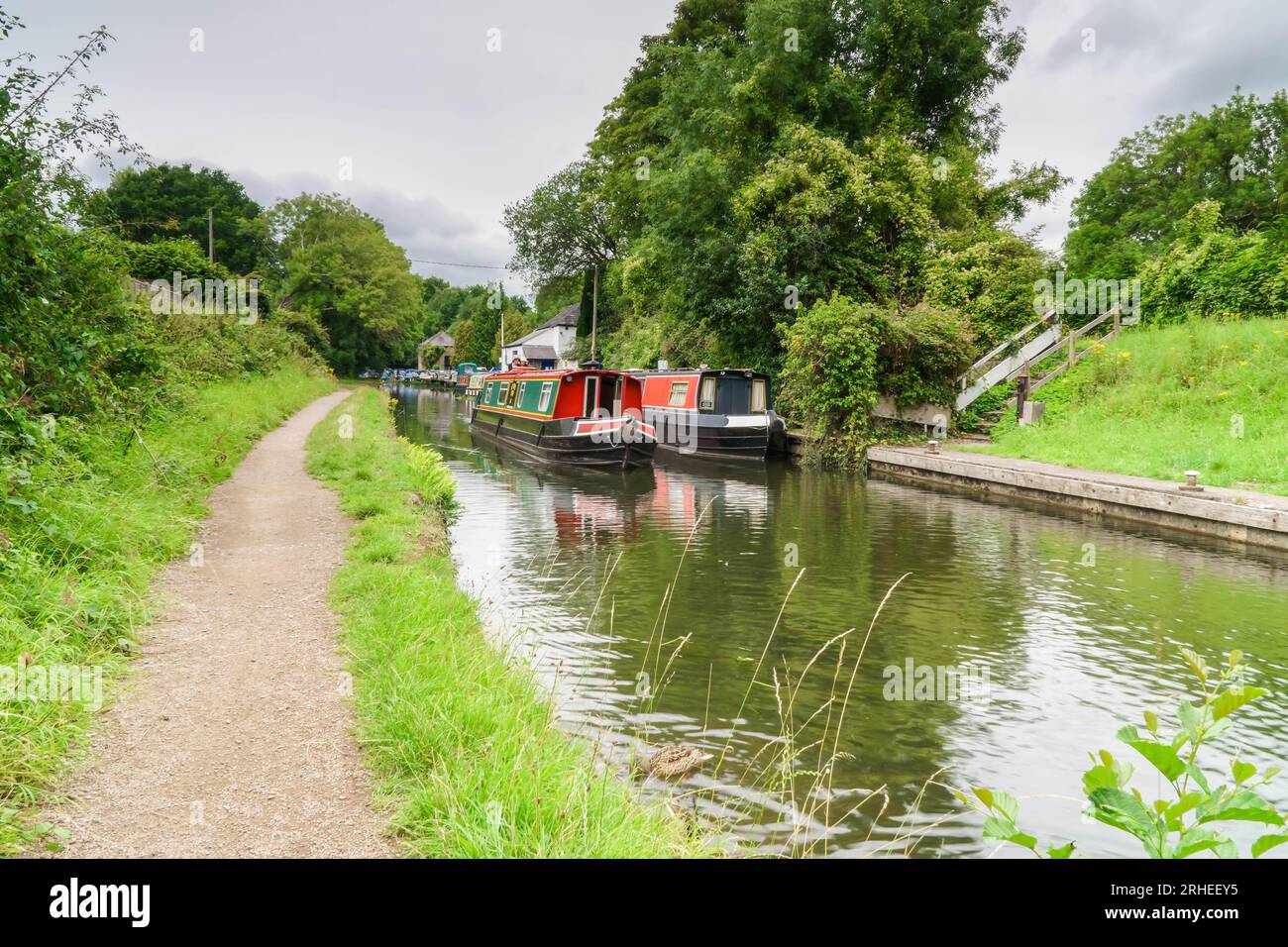 Canal boats moored up along the Monmouthshire and Brecon Canal at ...