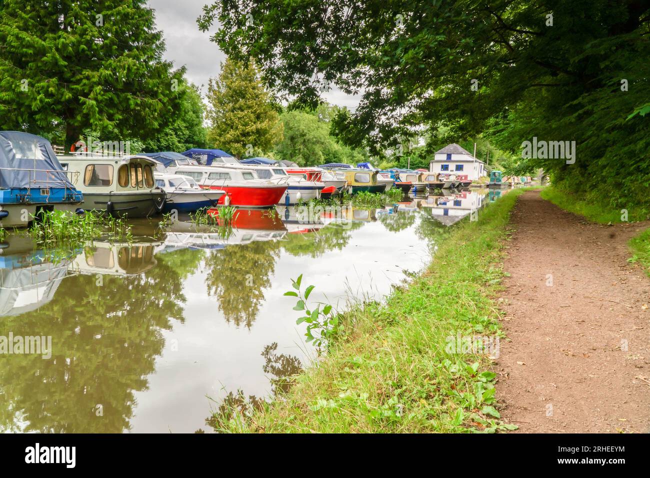 Canal boats moored up along the Monmouthshire and Brecon Canal at ...