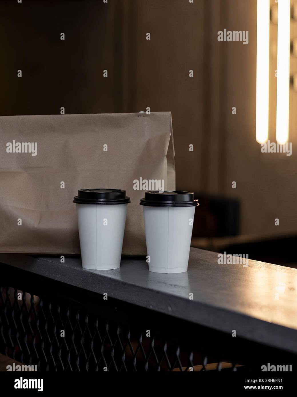 two cups of coffee with carton bag, take away food, delivery coffee to ...