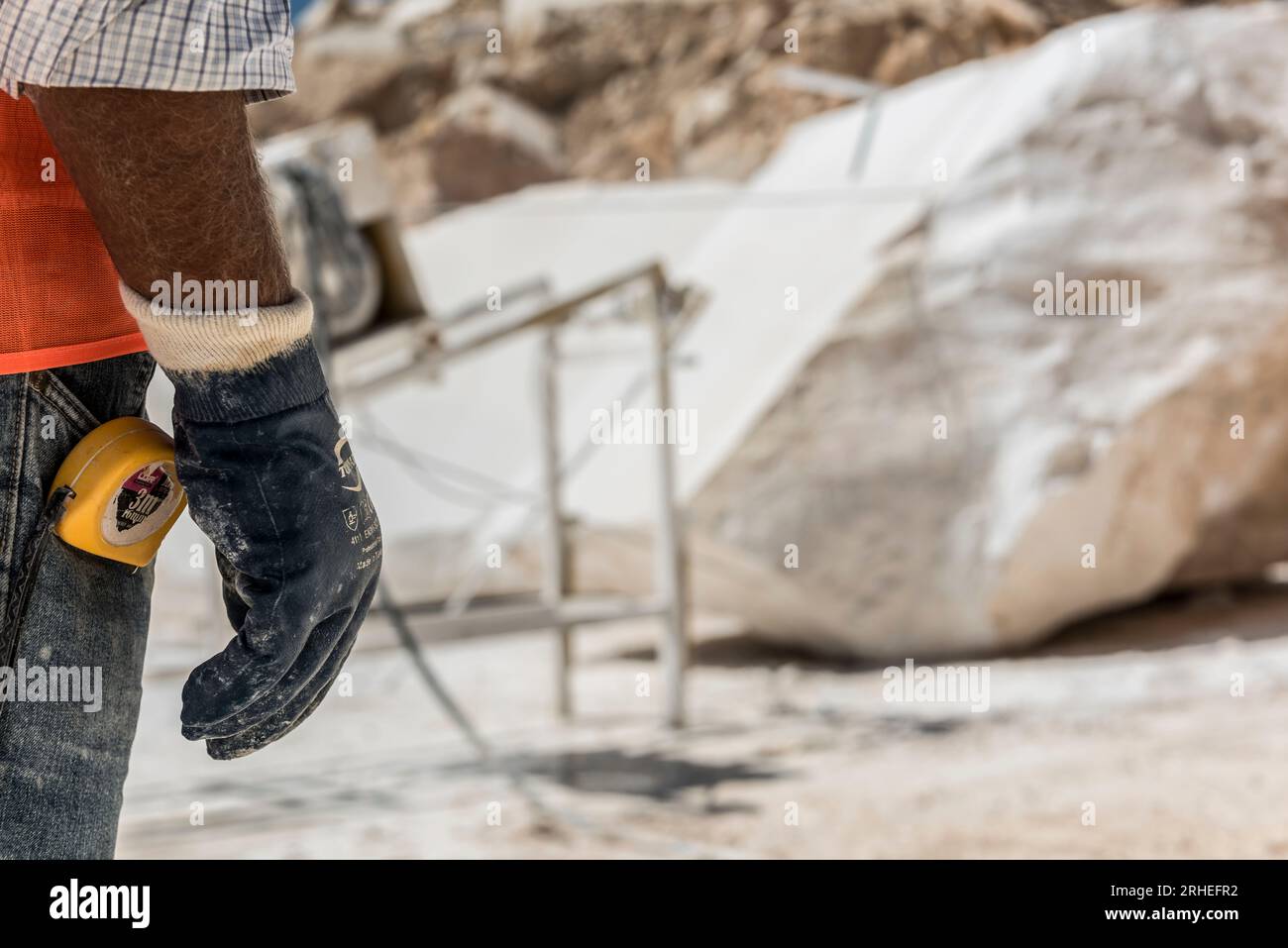 beautiful and artistic photograph of a marble mine. including men ...