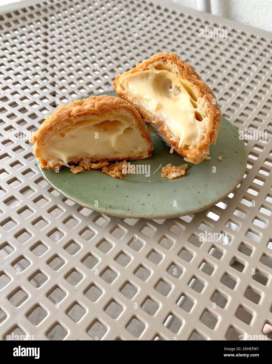cheese pie on a pink table, ready to enjoy dessert with ground biscuit ...