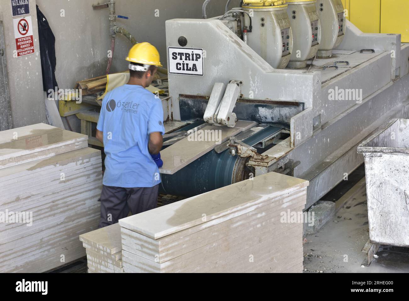 man in stone cutting factory/workshop. stone mine. marble mine ...