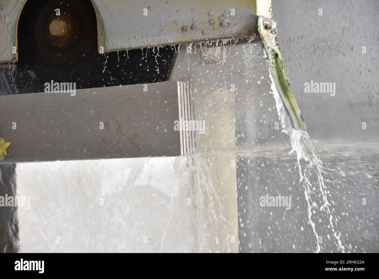 man in stone cutting factory/workshop. stone mine. marble mine ...