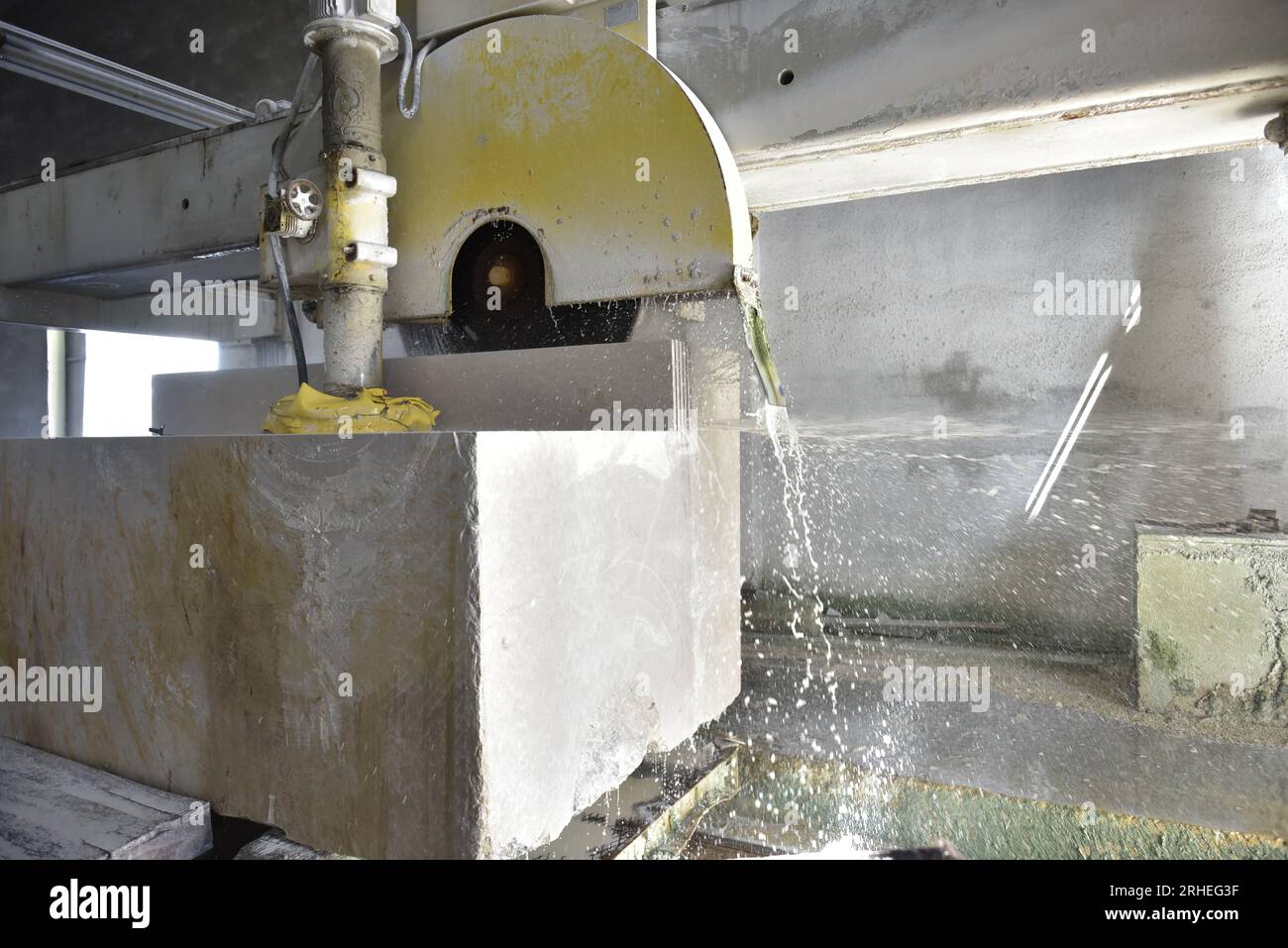 man in stone cutting factory/workshop. stone mine. marble mine ...
