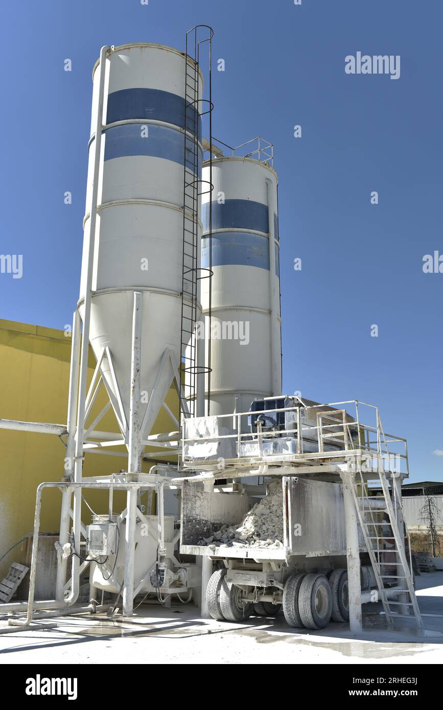 man in stone cutting factory/workshop. stone mine. marble mine ...