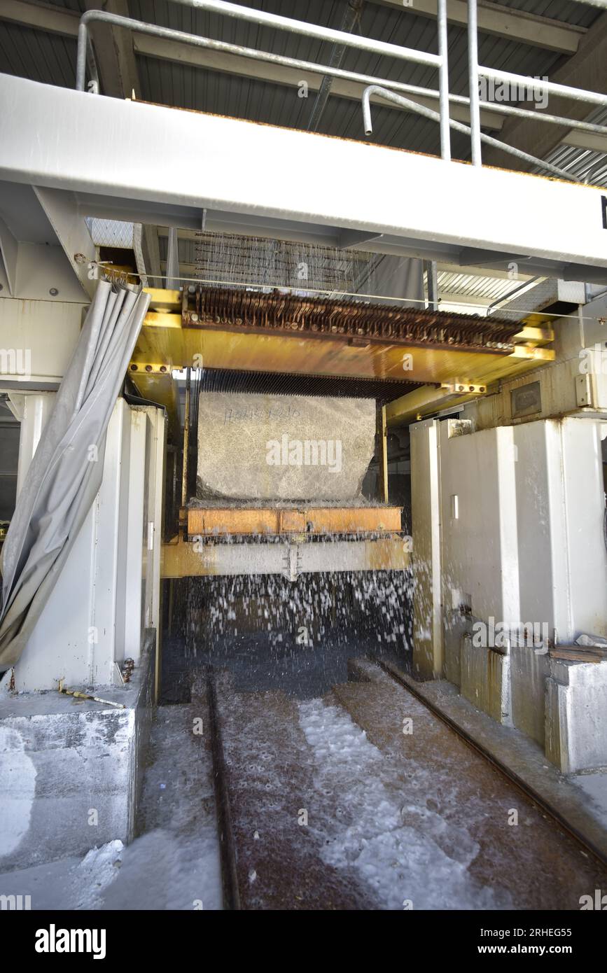 man in stone cutting factory/workshop. stone mine. marble mine ...