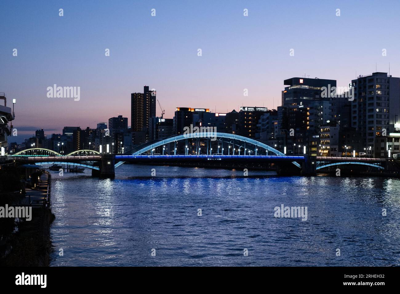 View along the Sumida River, Asakusa, Tokyo, Japan at night, with ...