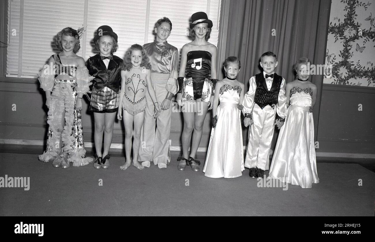 1950s, historical, a group of young children in their performance or ...