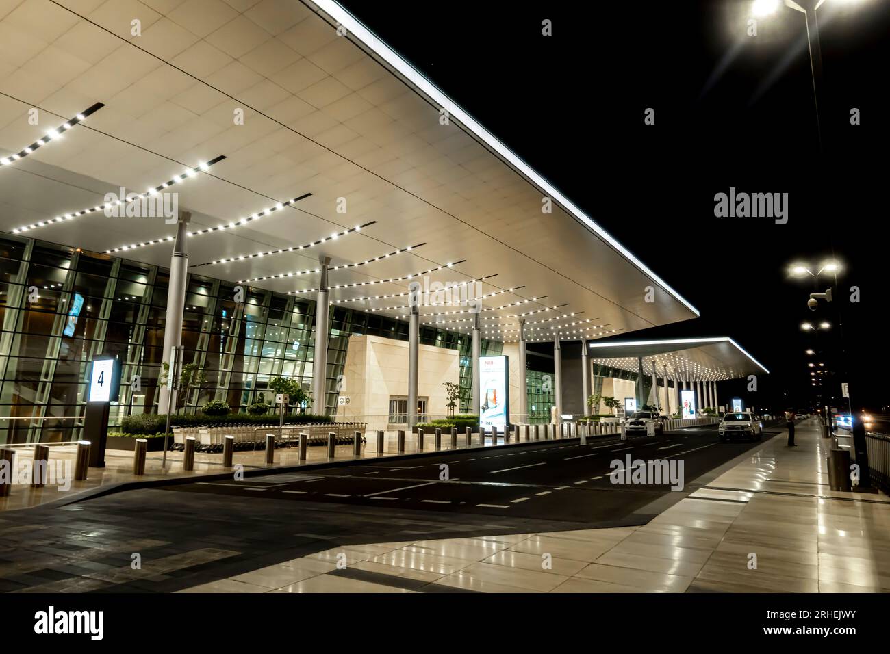 Bahrain airport exterior building night view Stock Photo - Alamy