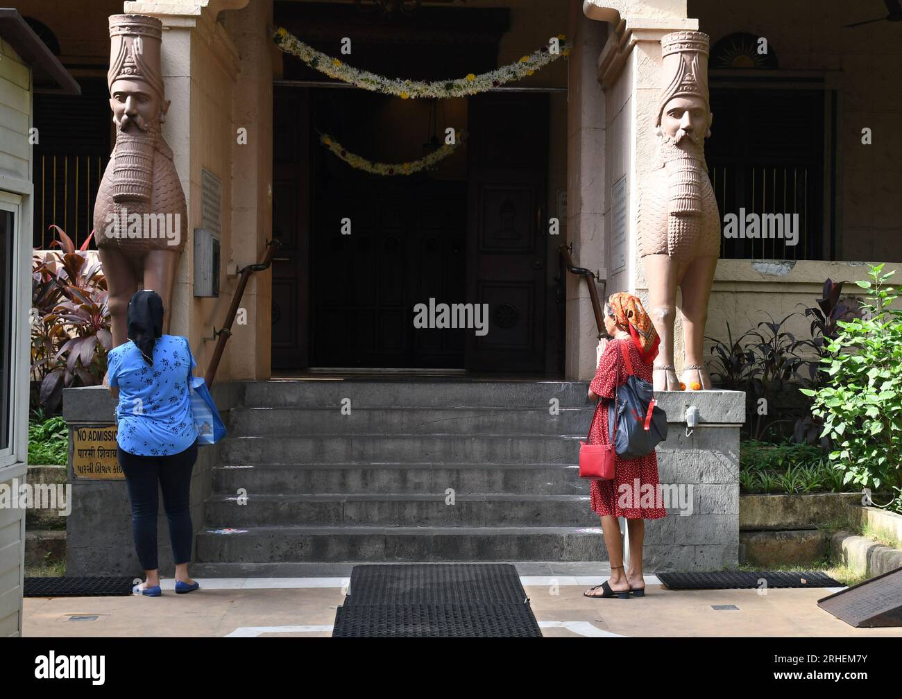 Mumbai, India. 16th Aug, 2023. Parsi women pray at the Agiary (fire ...