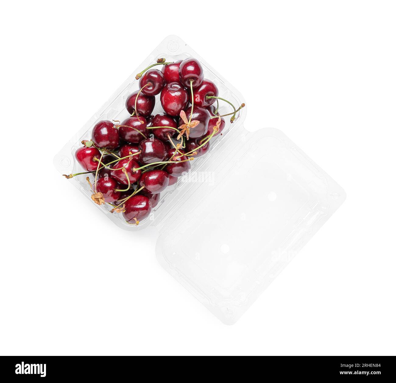 Plastic container with fresh cherry on white background Stock Photo - Alamy